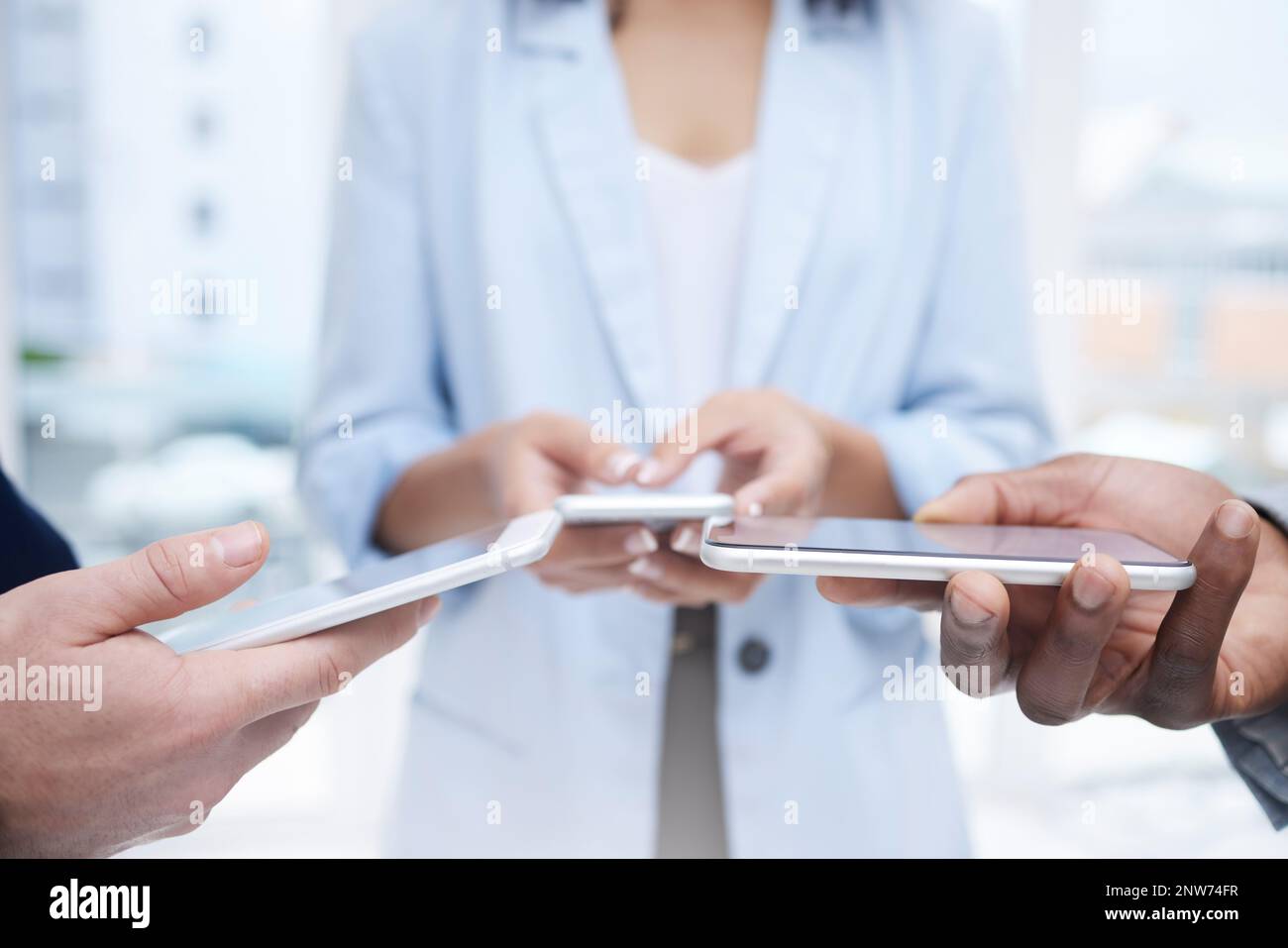 Business people, hands and phone for team networking, data share or ...