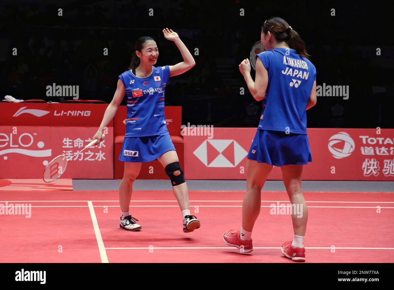 Misaki Matsutomo, left, and Ayaka Takahashi of Japan react after ...