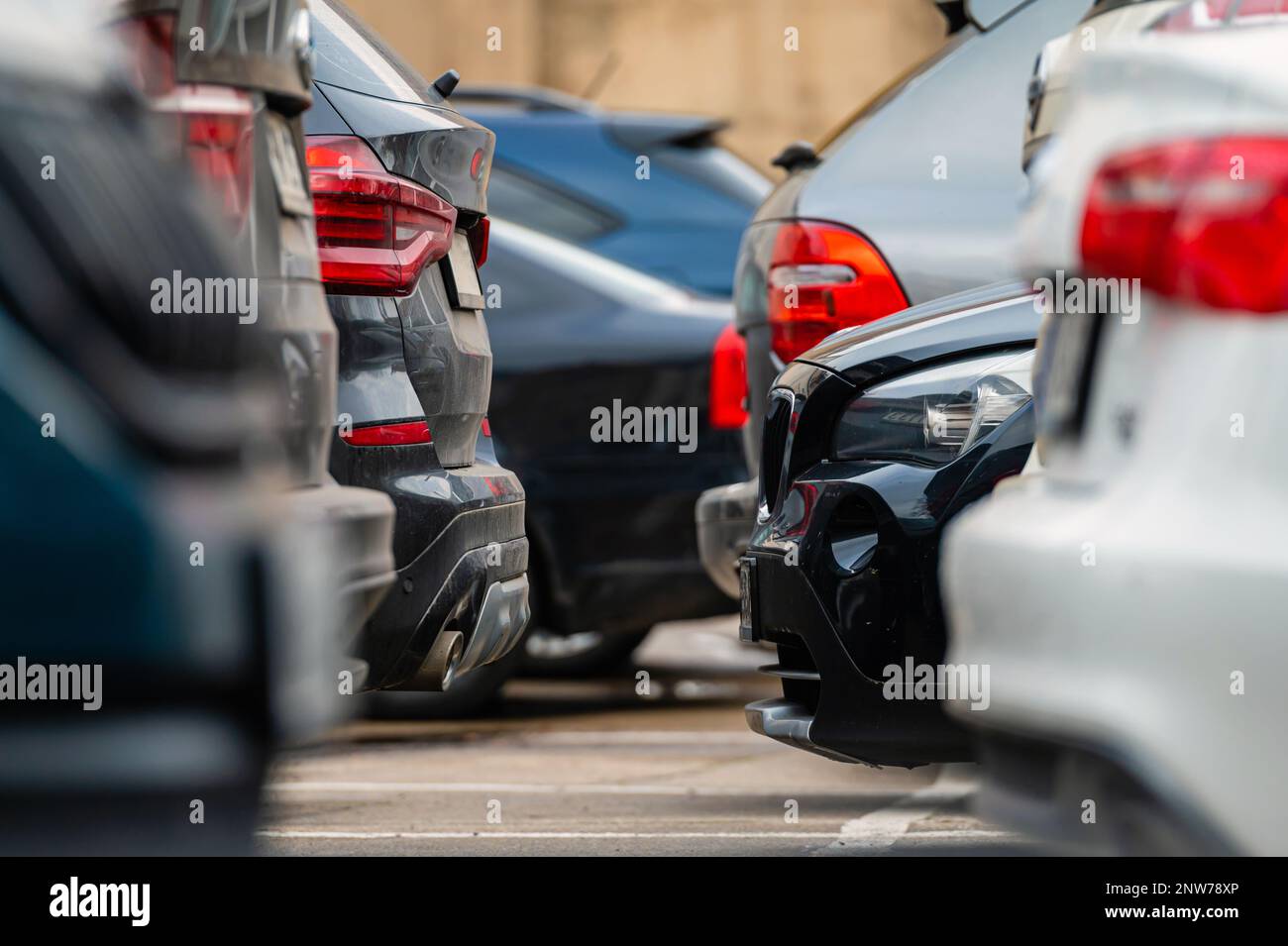 Tight City Parking Full of Cars. Lot of cars are parked in the parking ...
