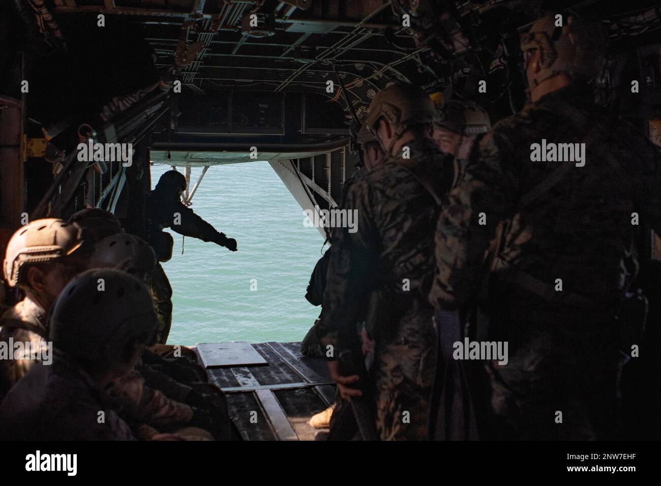 U.S. Marines with Alpha Company, 2nd Reconnaissance Battalion line up ...