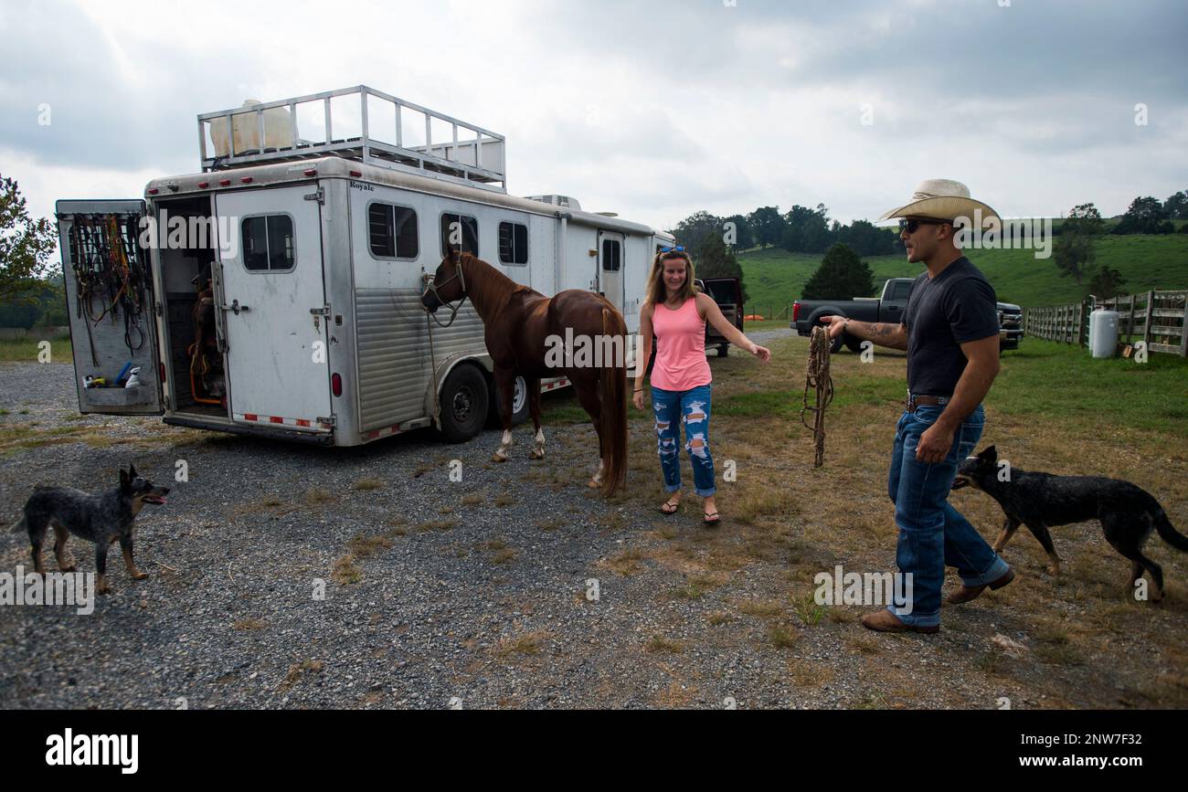 Julia Prebula and Austin Beaty prepare for a rodeo at his home in ...