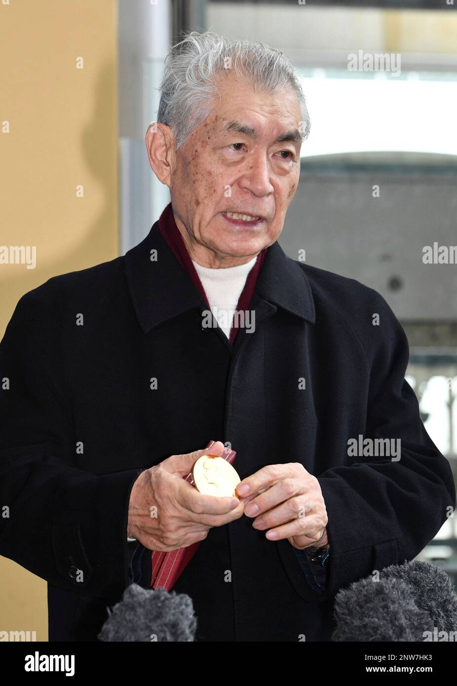 Tasuku Honjo, a distinguished professor at Kyoto University, holding ...