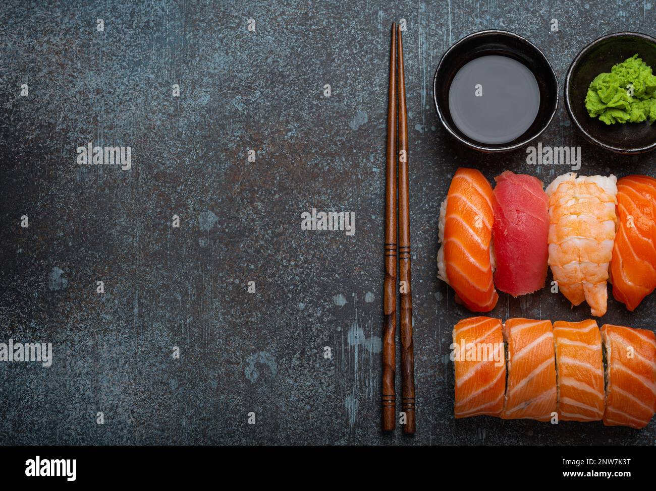 Set of traditional Japanese sushi and rolls top view with soy sauce and ...