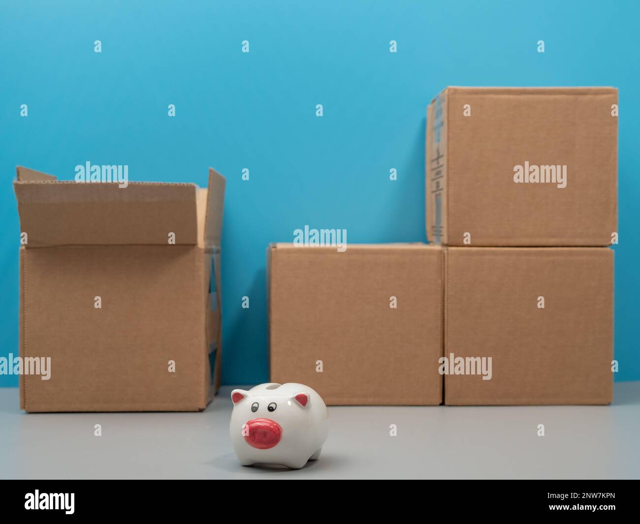 Humanitarian aid. Cardboard boxes with donations on a blue background ...