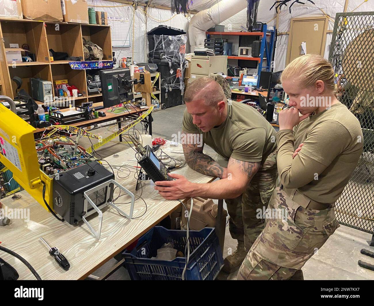 Sgt. Justin McCurdy and Spc. Elizabeth Dunfee of JTF MED 374 run ...