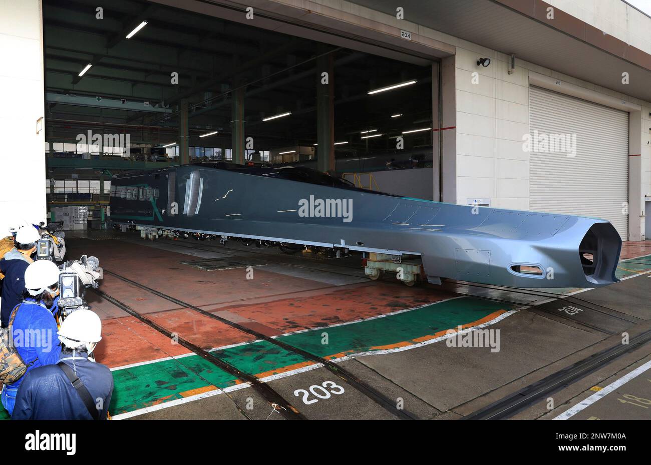 A test car, named ALFA-X, of a new Shinkansen bullet train model ...