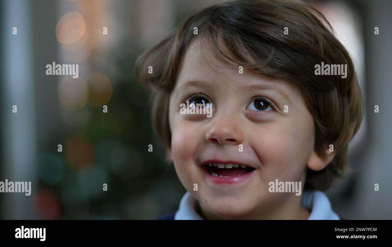 One excited little boy face close up. Surprised adorable 2 year old kid ...