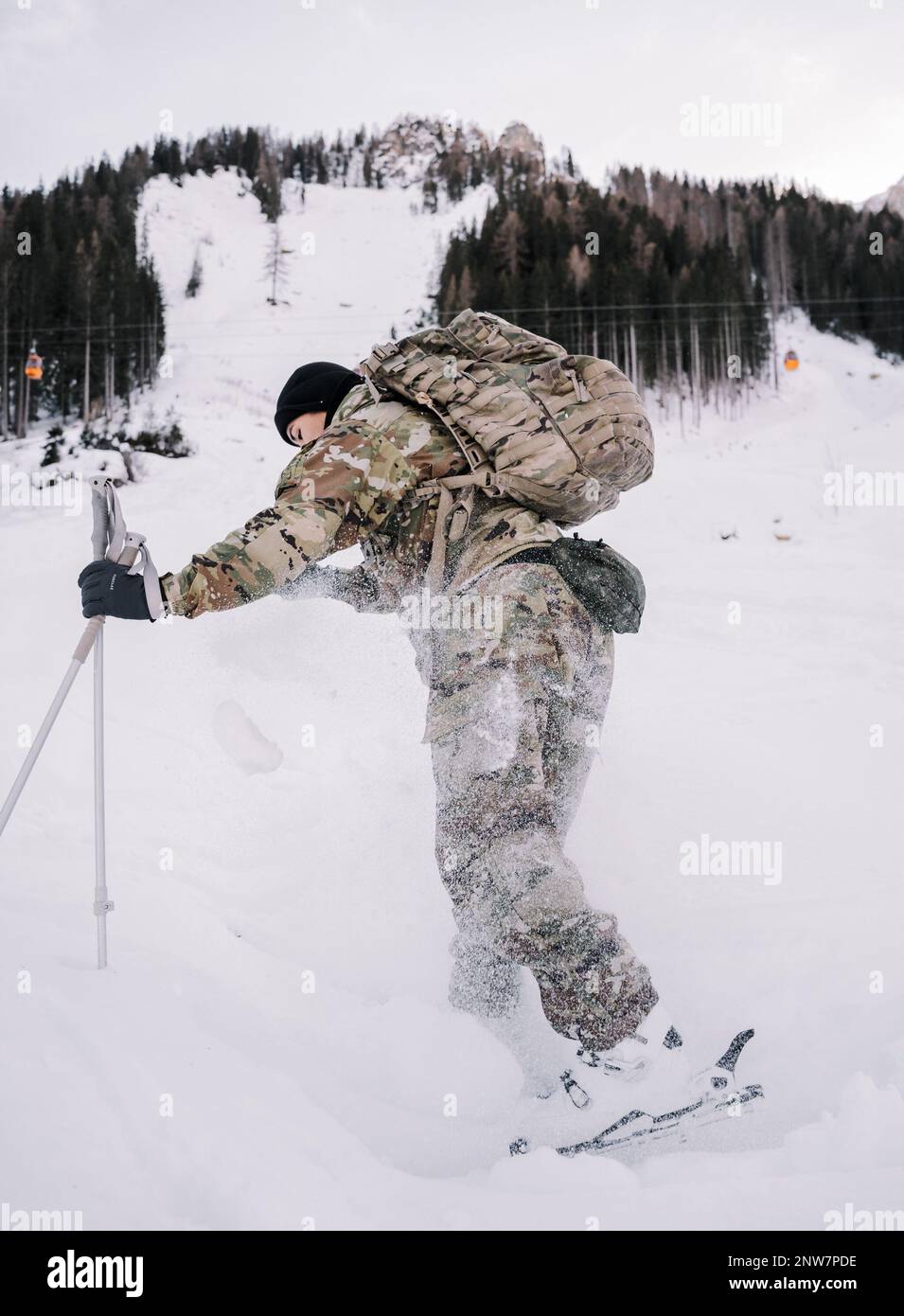 A U.S. Army Paratrooper assigned to the 173rd Airborne Brigade ascends ...