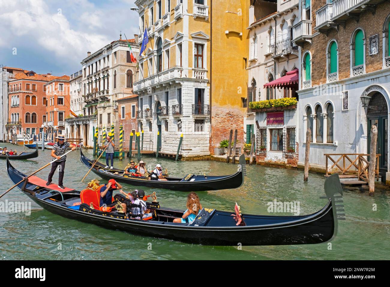Grand Canal / Canal Grande with gondoliers in traditional gondolas ...