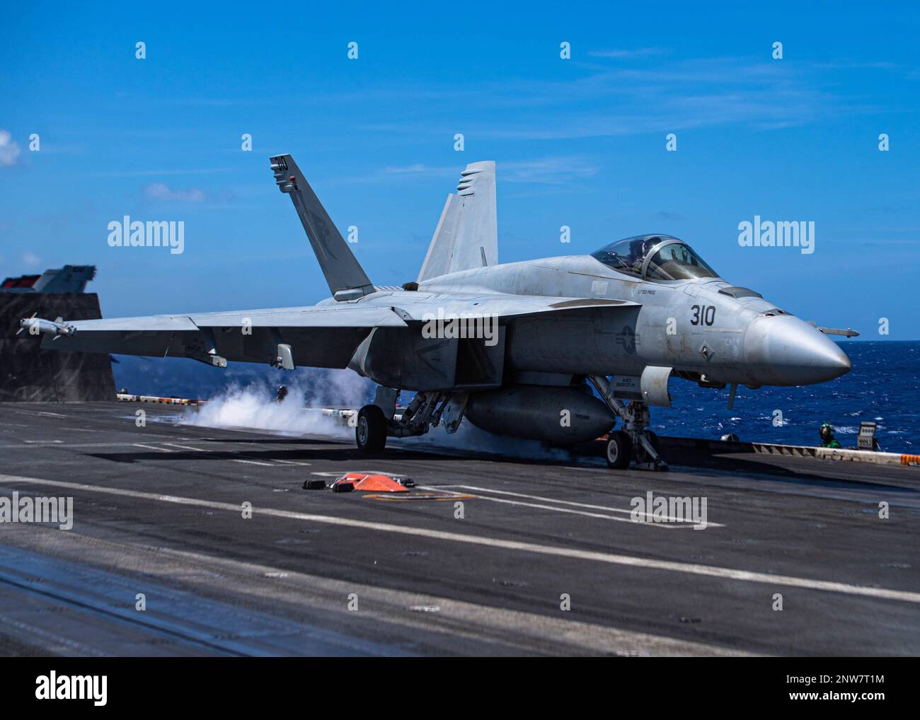 230223-N-MH015-1097 PHILIPPINE SEA (Feb. 23, 2023) An F/A-18E Super Hornet from the “Kestrels ...