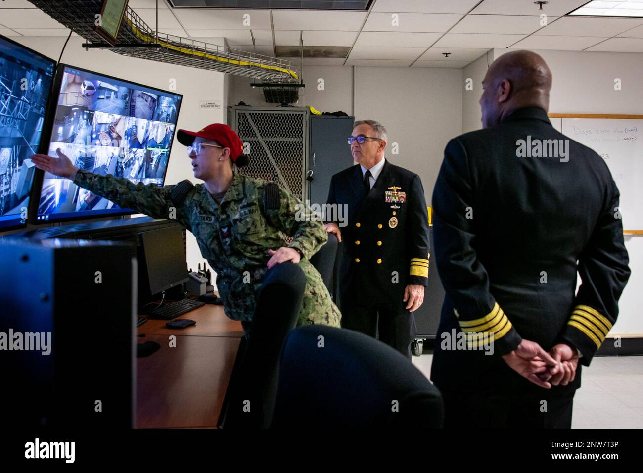 Quartermaster 1st Class Heather Vautard, from Dover, Delaware, left ...