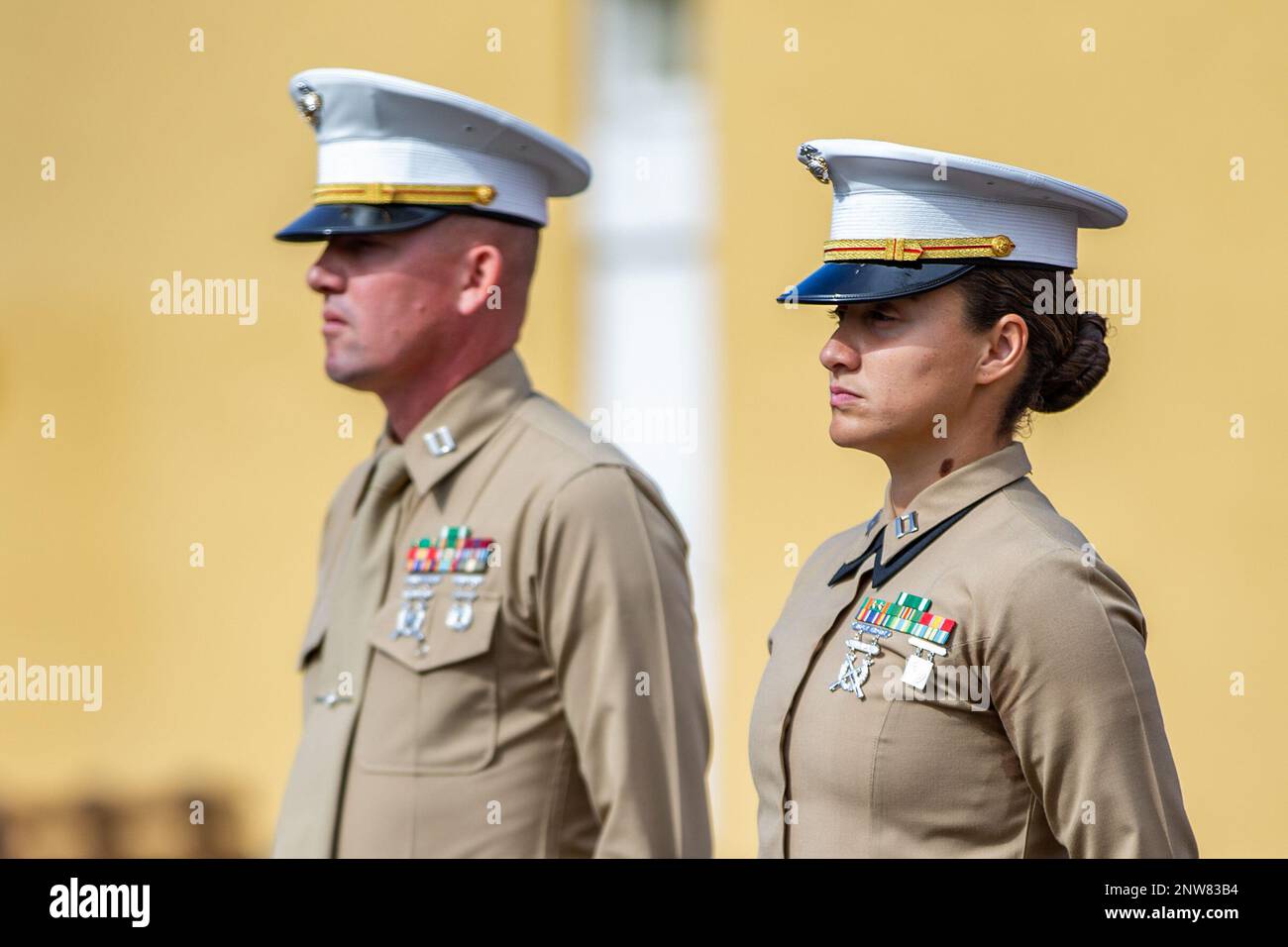 U.S. Marine Corps Capt. Mylen Morales relieves Capt. Alan Buck of his ...