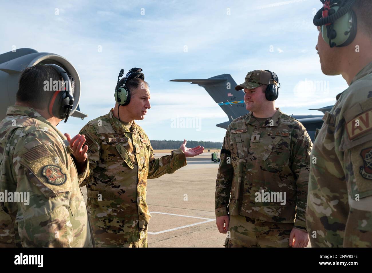 Col. Matt Husemann, 436th Airlift Wing commander, second to the left ...