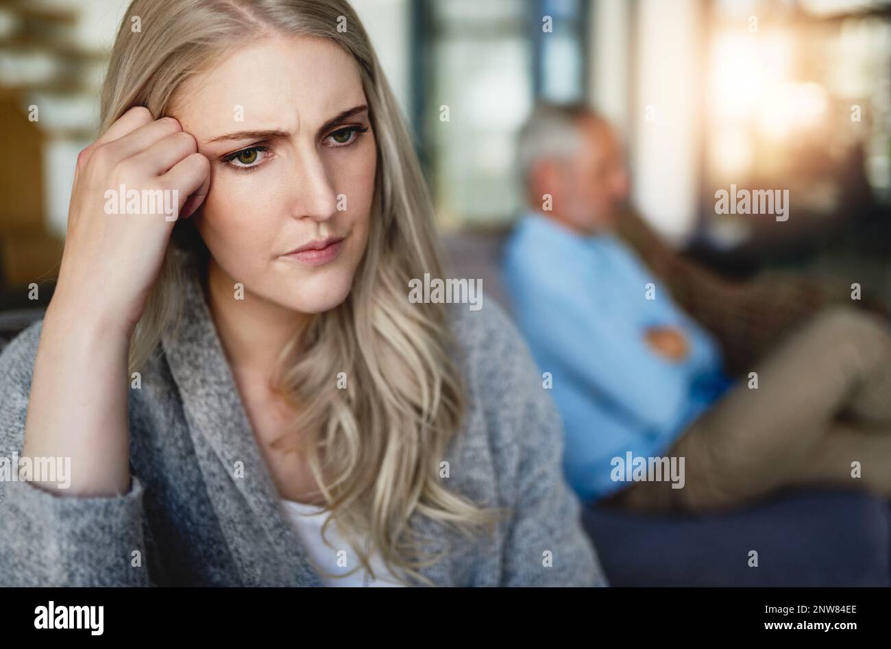 Theres a wall between their marriage. Cropped shot of a woman looking ...