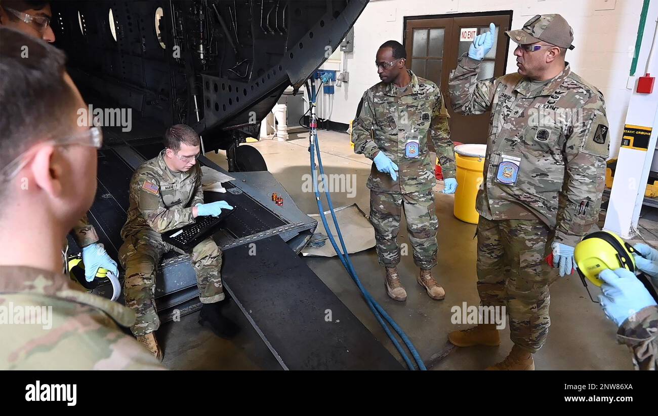 U.S. Army Pfc. Justin Mayhew, left, 1st Battalion, 210th Aviation ...