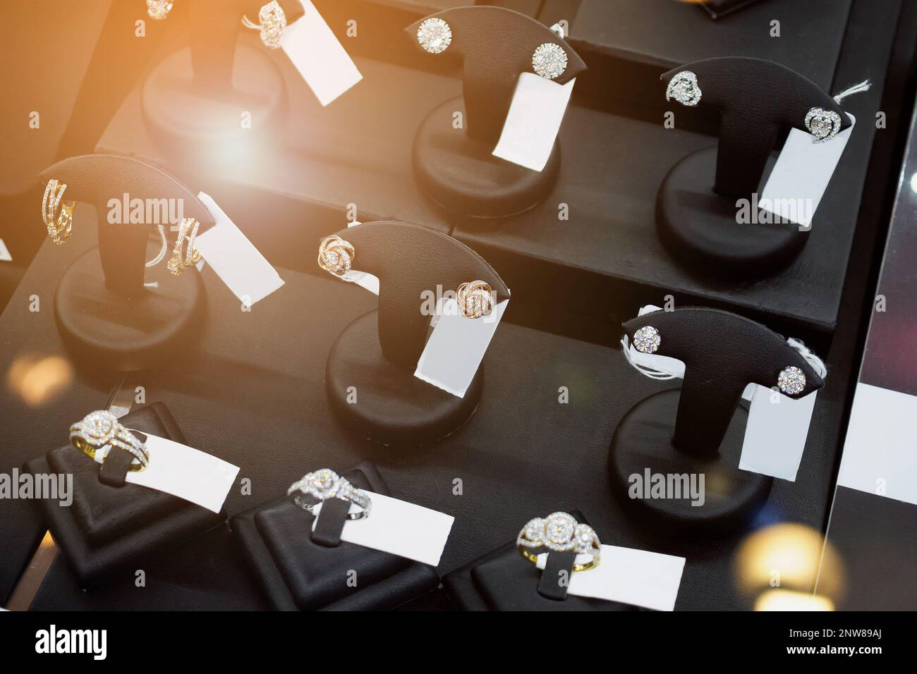 Diamond rings with blank price tag show in jewelry luxury store window ...