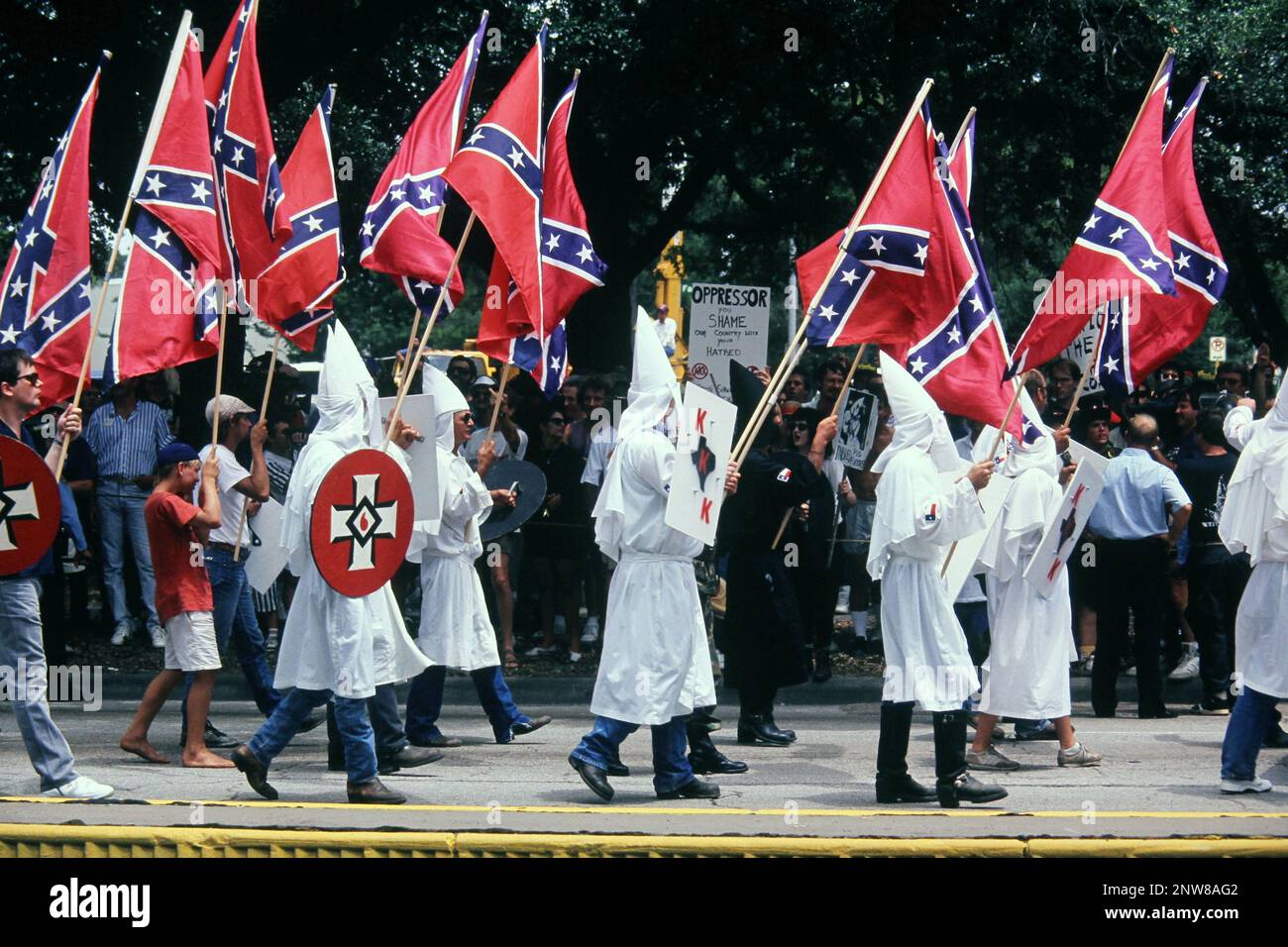 A Ku Klux Klan march in Houston Texas during the Economic Summit in ...