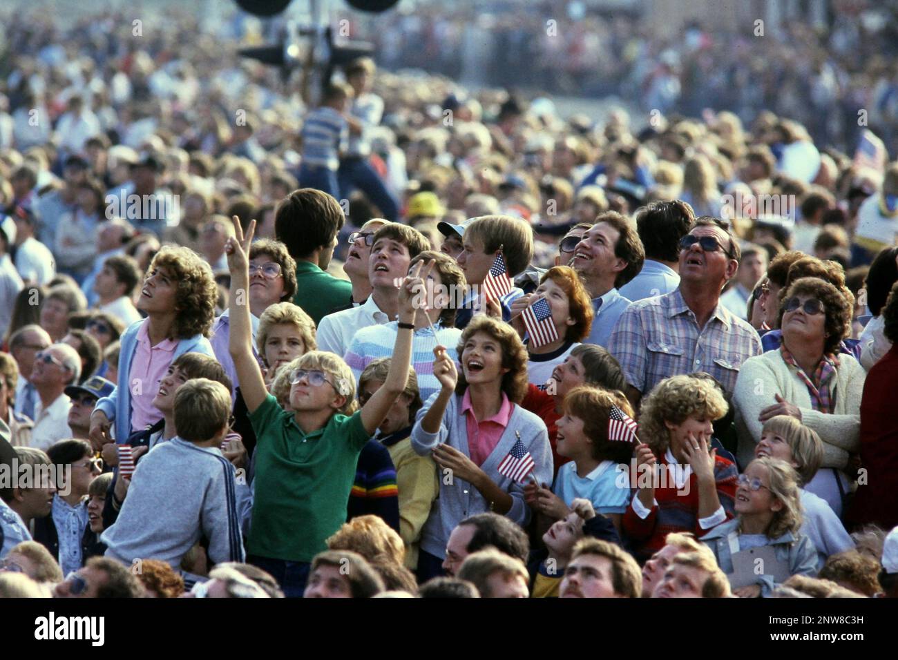 The crowd reacts while seeing Reagan during ghe Reagan campaign train ...