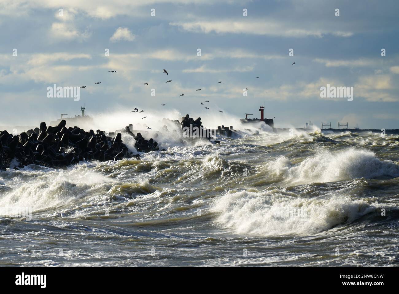 Coastal storm in the Baltic Sea, big waves crash against the concrete ...