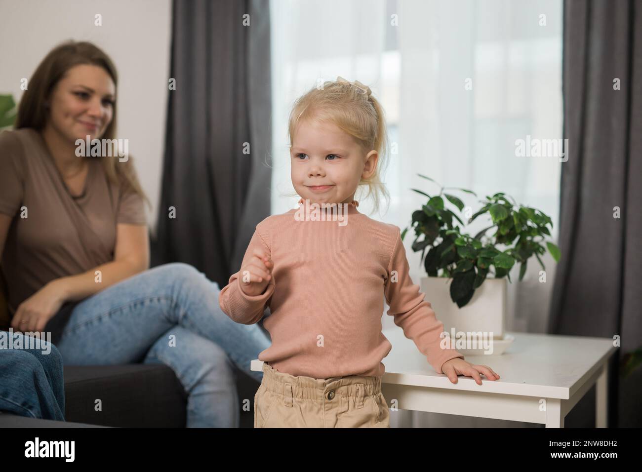 Cochlear implant system. Installation cochlear implant on child girl ...