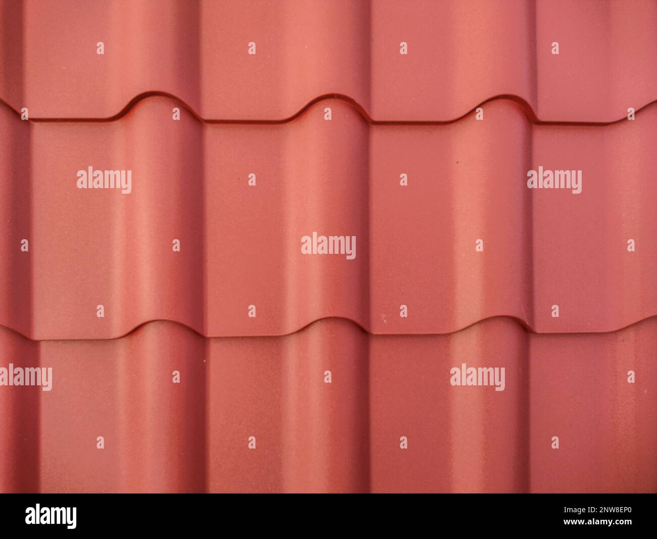 Metal tile for the roof of buildings Stock Photo - Alamy