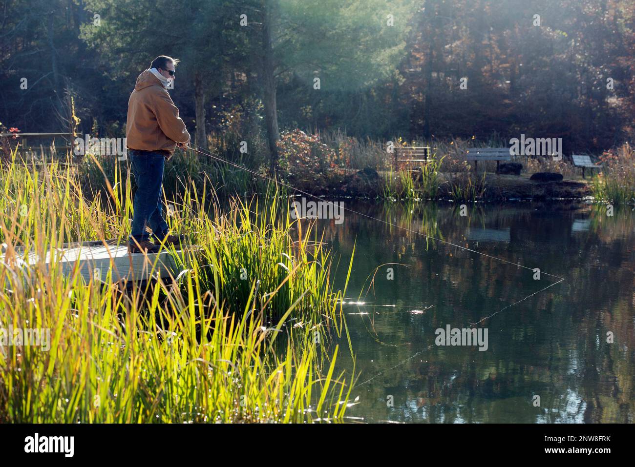 Bill Dorsey of Bullard fishes at Tyler State Park Lake on Wednesday ...