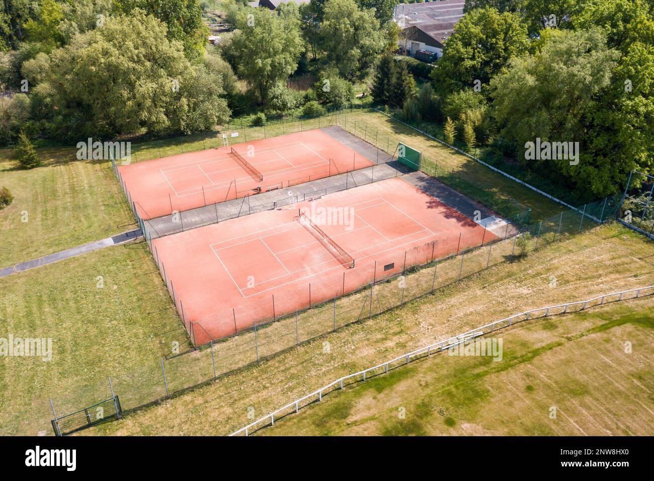 Aerial view of two tennis courts side by side Stock Photo - Alamy