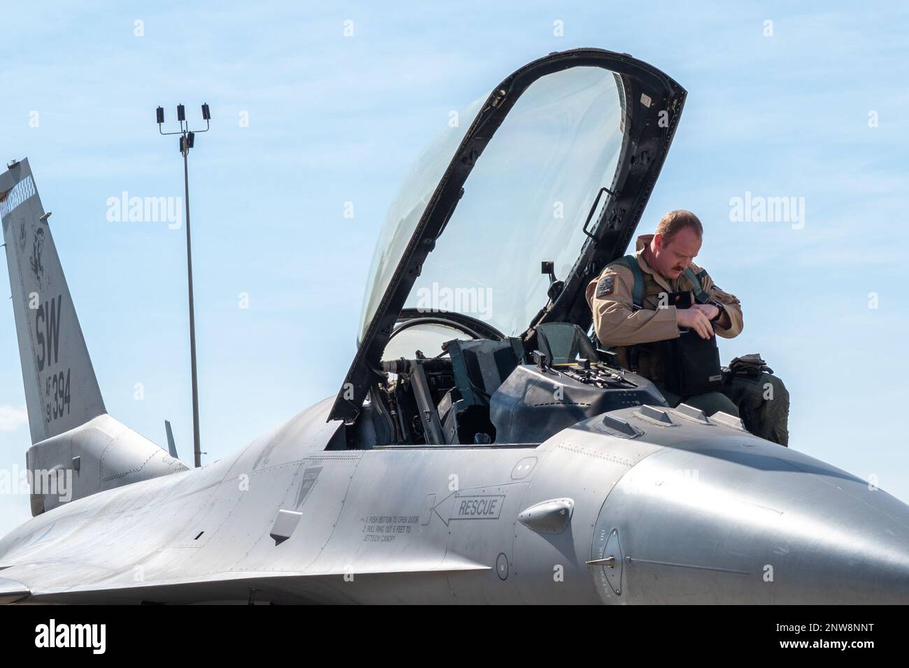 A U.S. Air Force pilot assigned to the 77th Expeditionary Fighter ...