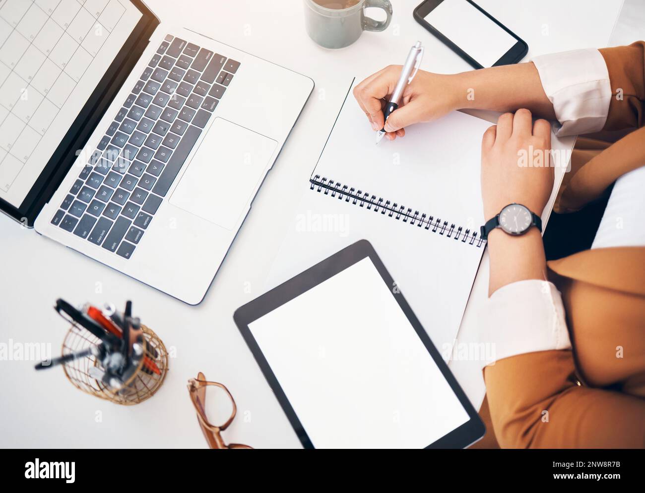 Planning, schedule and hands of a woman writing an idea, information or ...