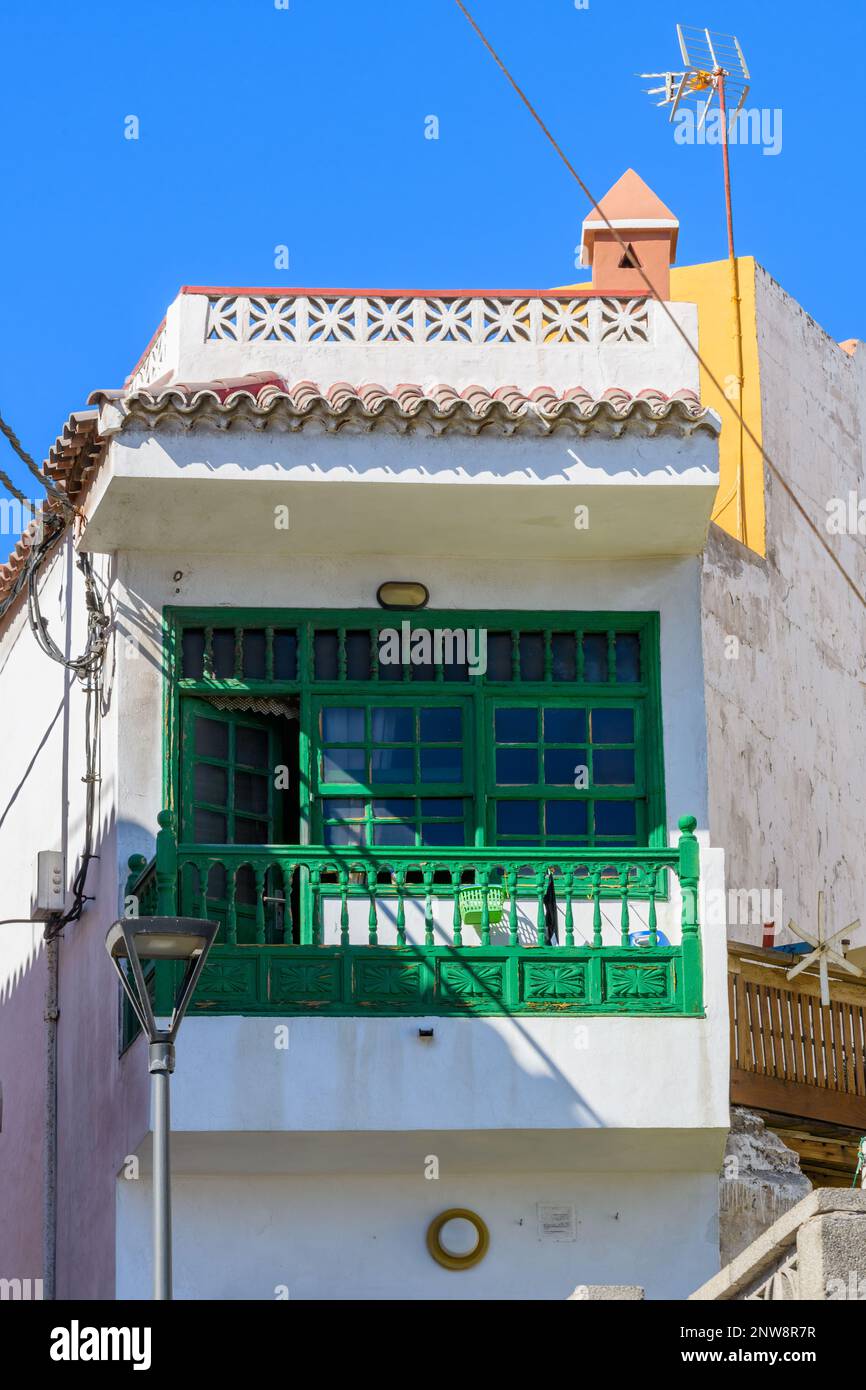Whitewashed building with tiles roof and window hi-res stock ...