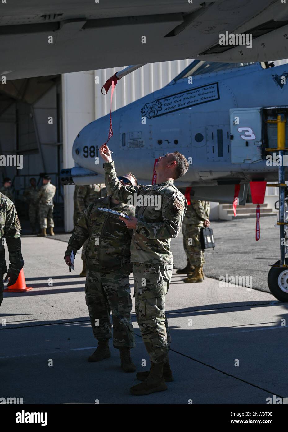 U.S. Air Force Airmen inspect an A-10 Thunderbolt II from the 924th ...