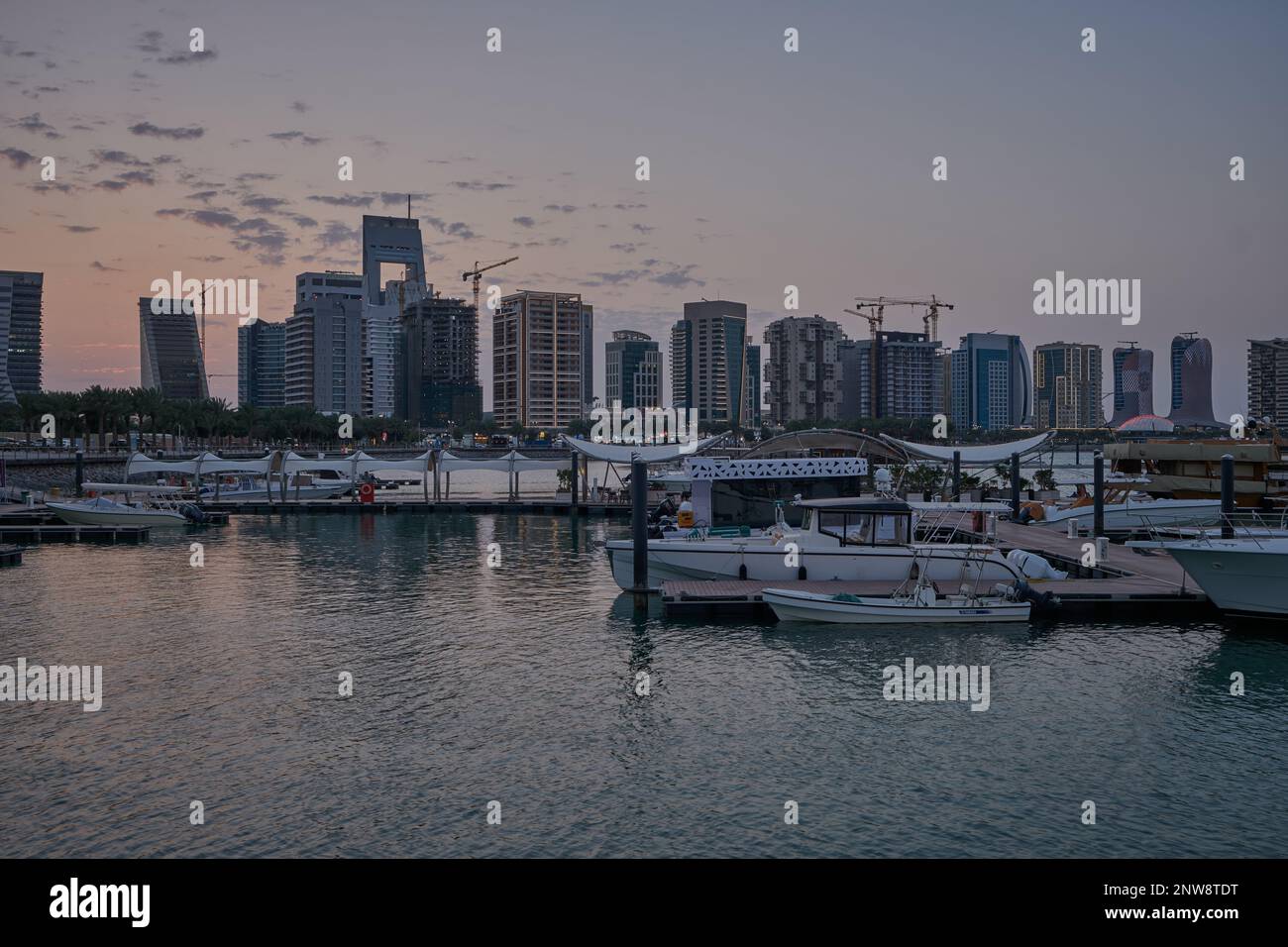 Lusail marina in Lusail city, Qatar sunset view with Yachts and boats ...