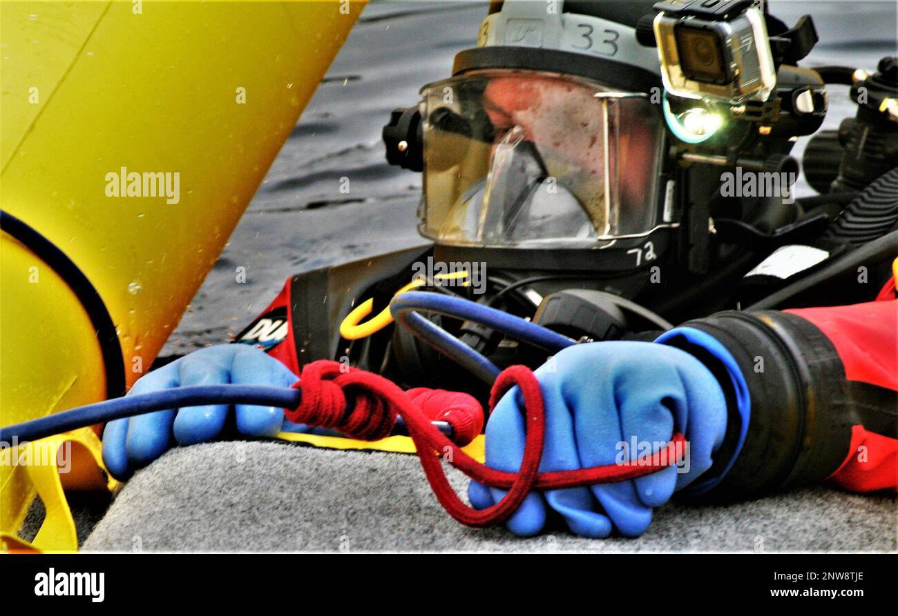 A firefighter with the Directorate of Emergency Services Fire ...