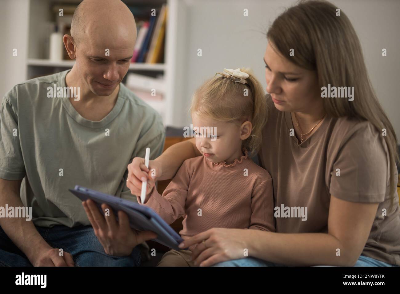 Cochlear implant system. Installation cochlear implant on child girl ...