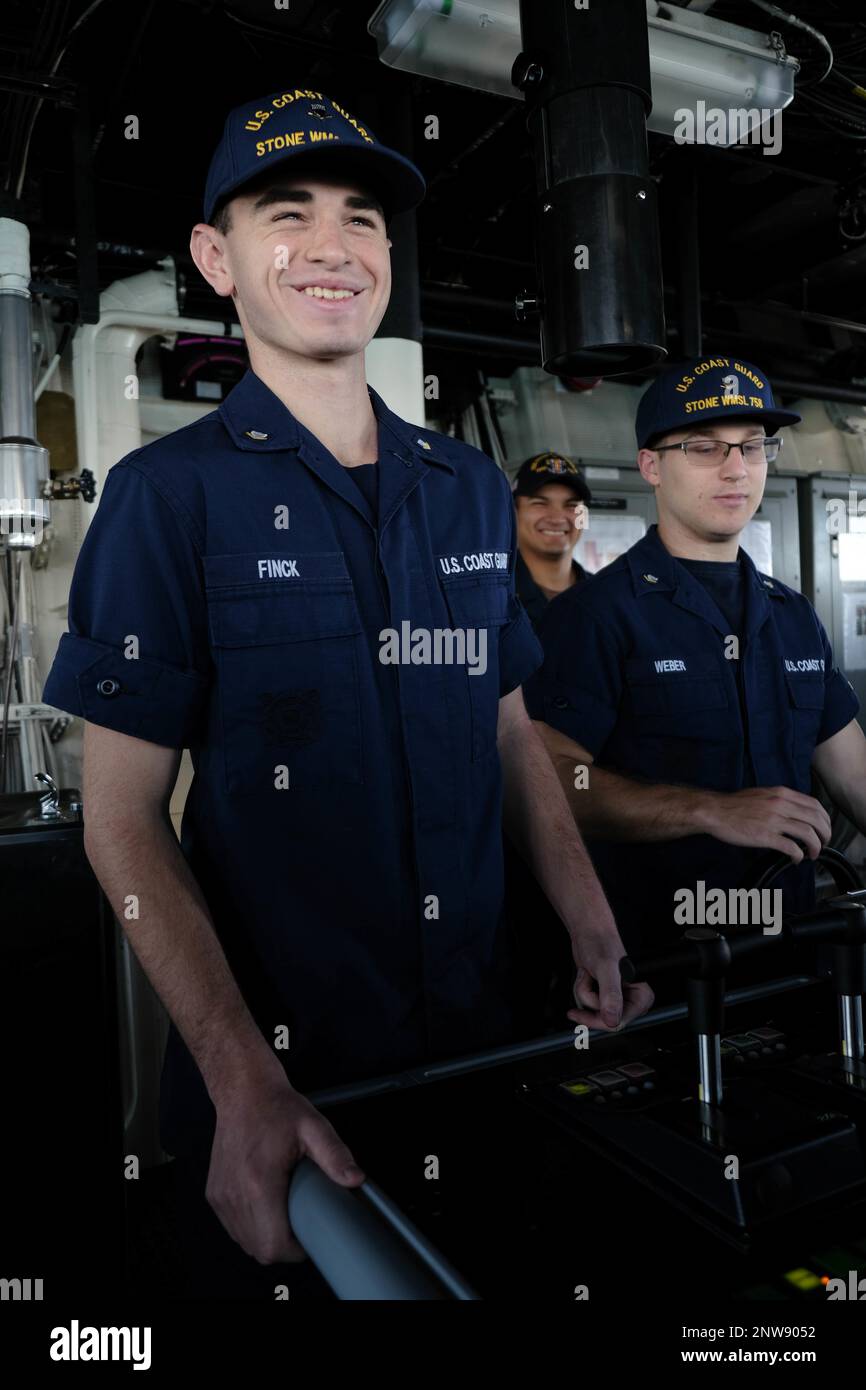 U.S. Coast Guard Petty Officer 3rd Class William Finck, a storekeeper ...