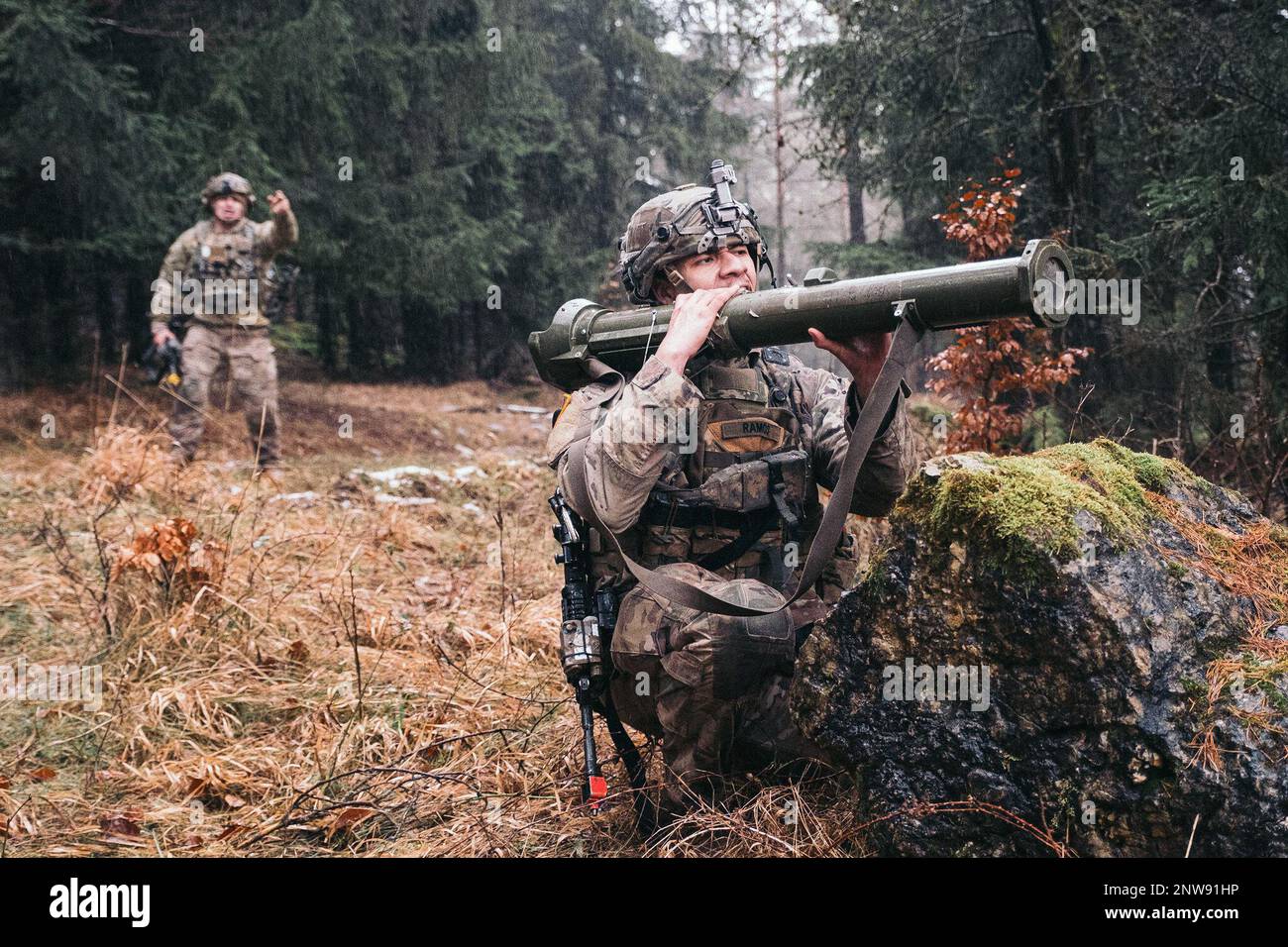 A U.S. Soldier, assigned to 2d Cavalry Regiment, prepares to fire an ...