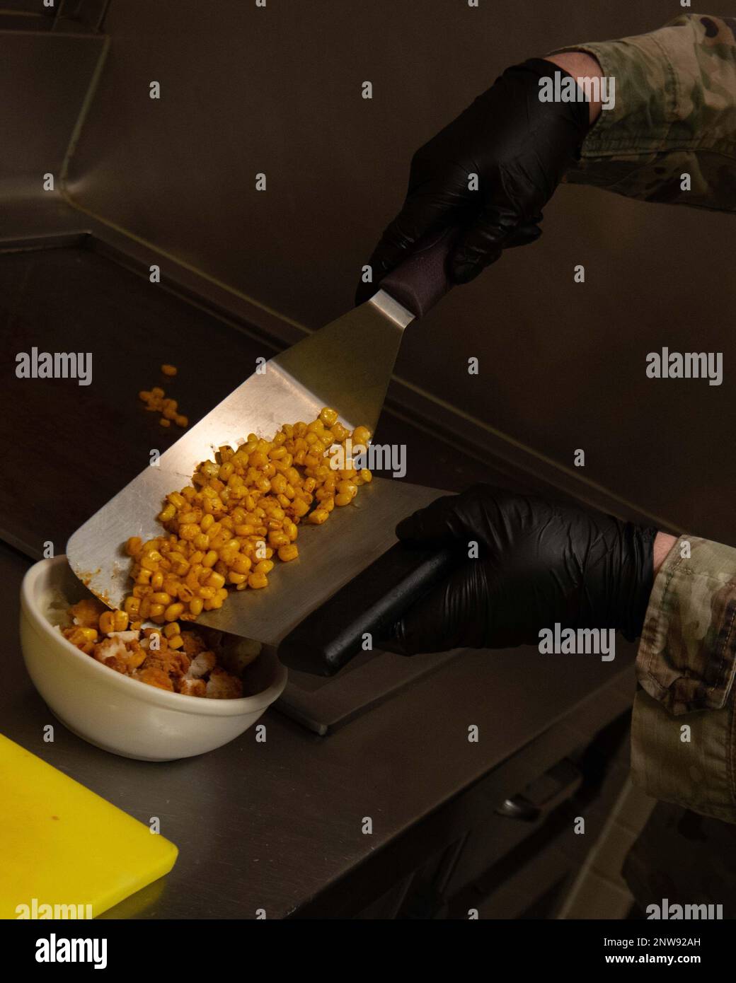 A 5th Force Support Squadron Missile Alert Facility (MAF) chef prepares ...