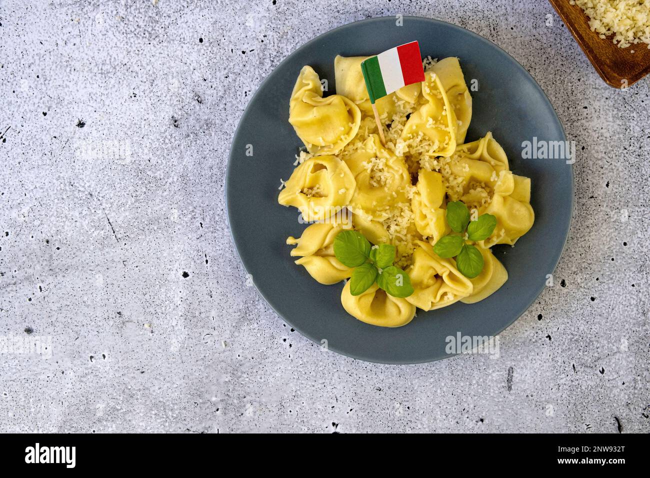 Italian ravioli in bowls with basil. Flag of Italy Stock Photo - Alamy