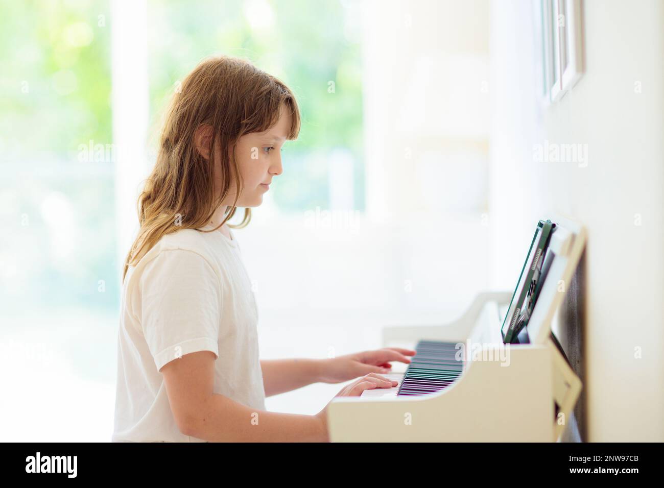 Child playing piano. Kids play music. Classical education for children ...