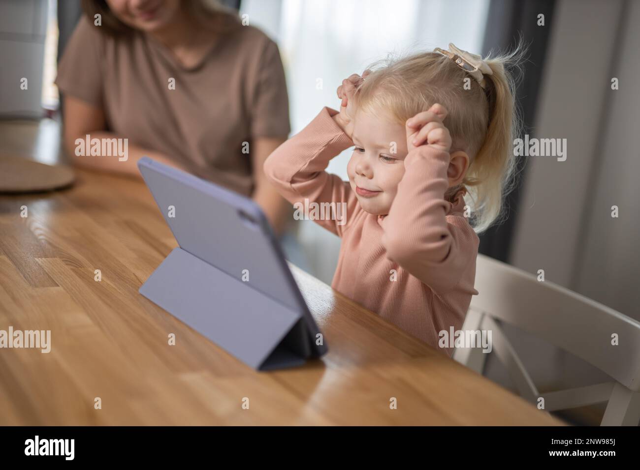 Cochlear implant system. Installation cochlear implant on child girl ...