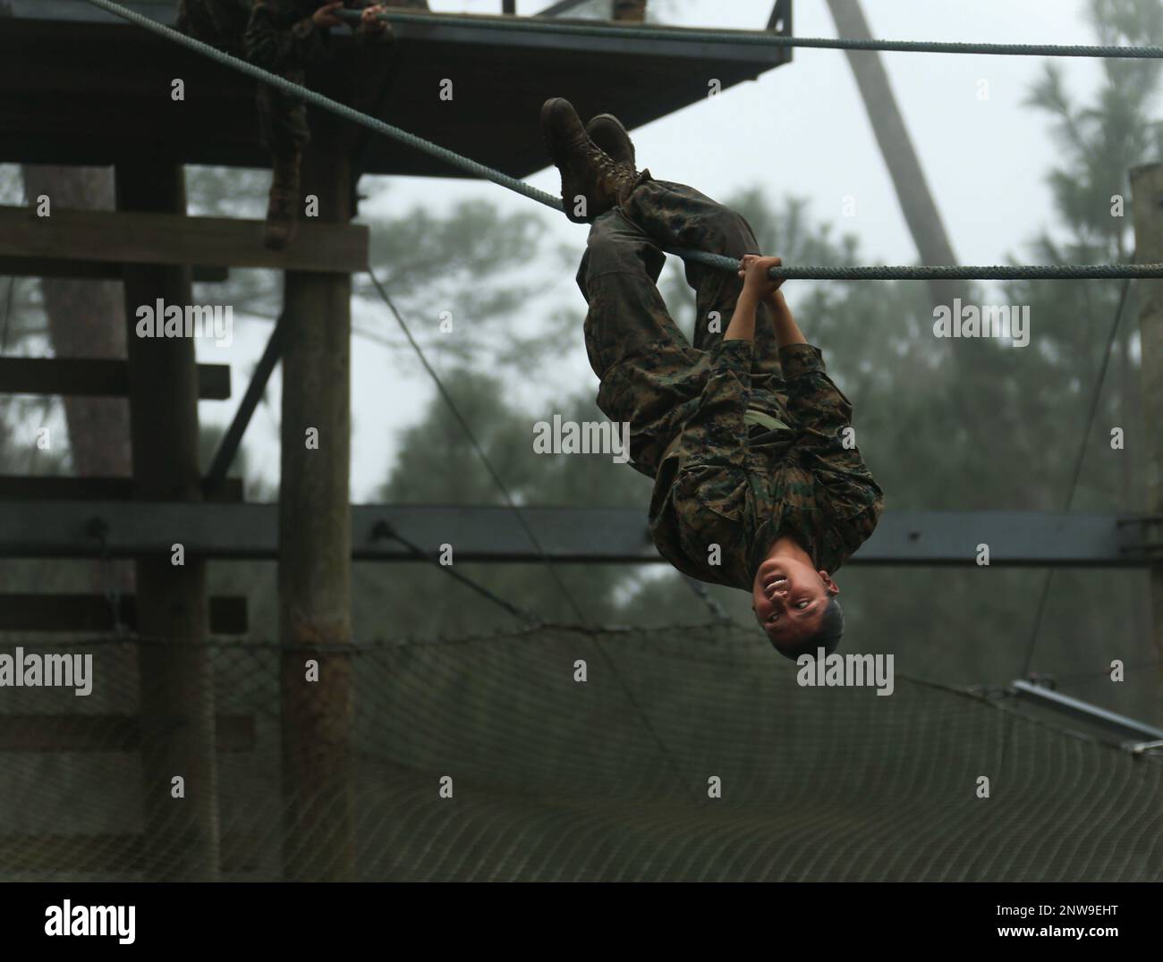 Recruits with Delta Company, 1st Recruit Training Battalion, navigate ...