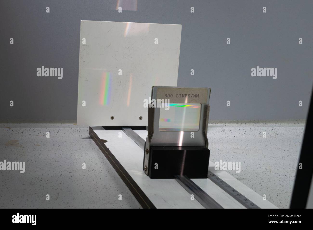 Diffraction experiment with rainbow colours in physics Stock Photo - Alamy