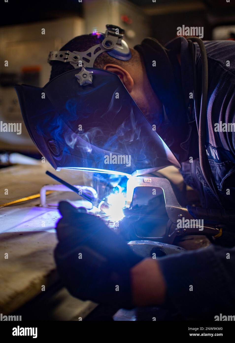 230123-N-JR318-1007 PORTSMOUTH, Va. (Jan. 23, 2023) Hull Maintenance ...