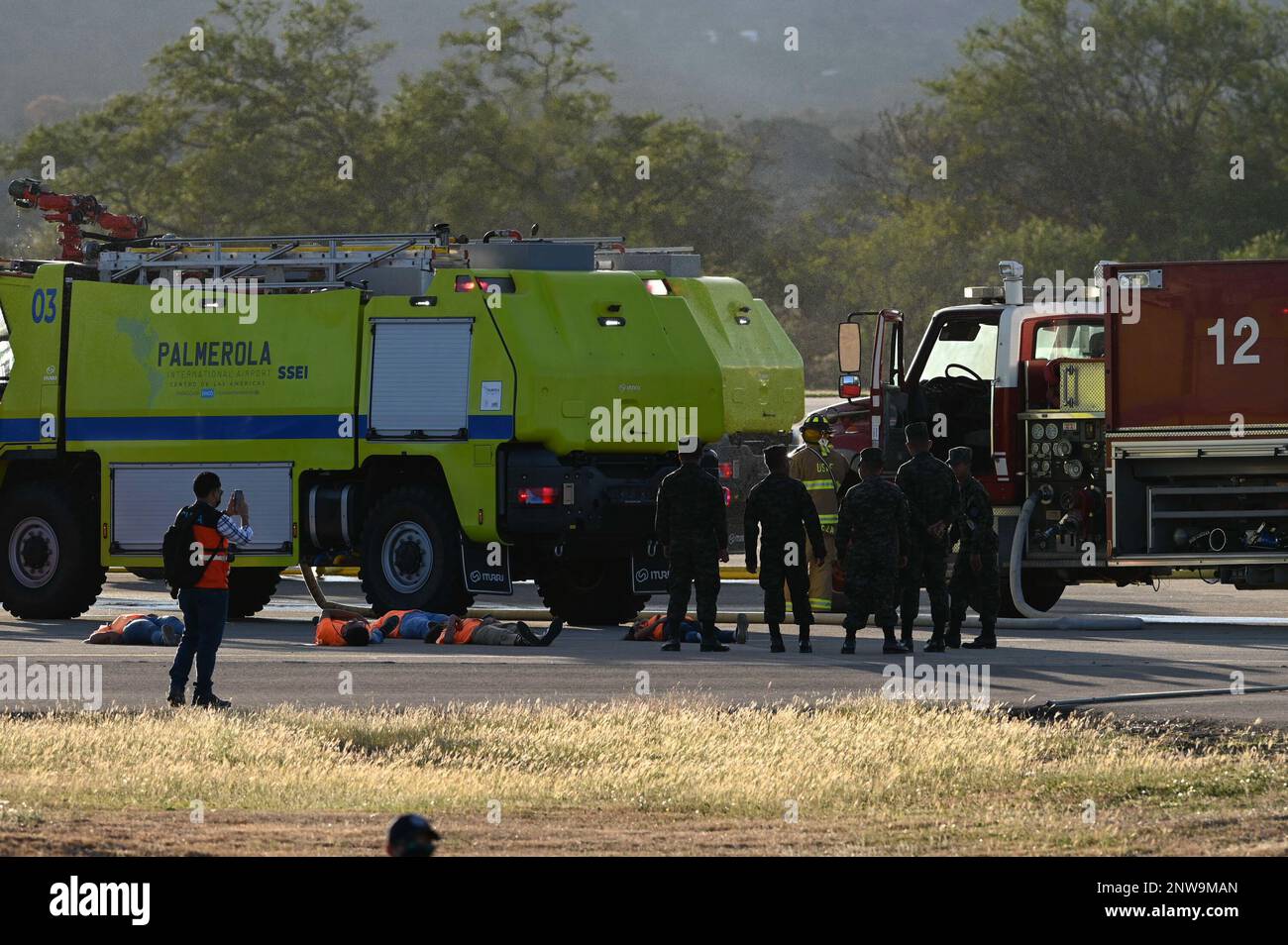 Senior Airman Justin Meza, 612th Air Base Squadron firefighter, refills ...