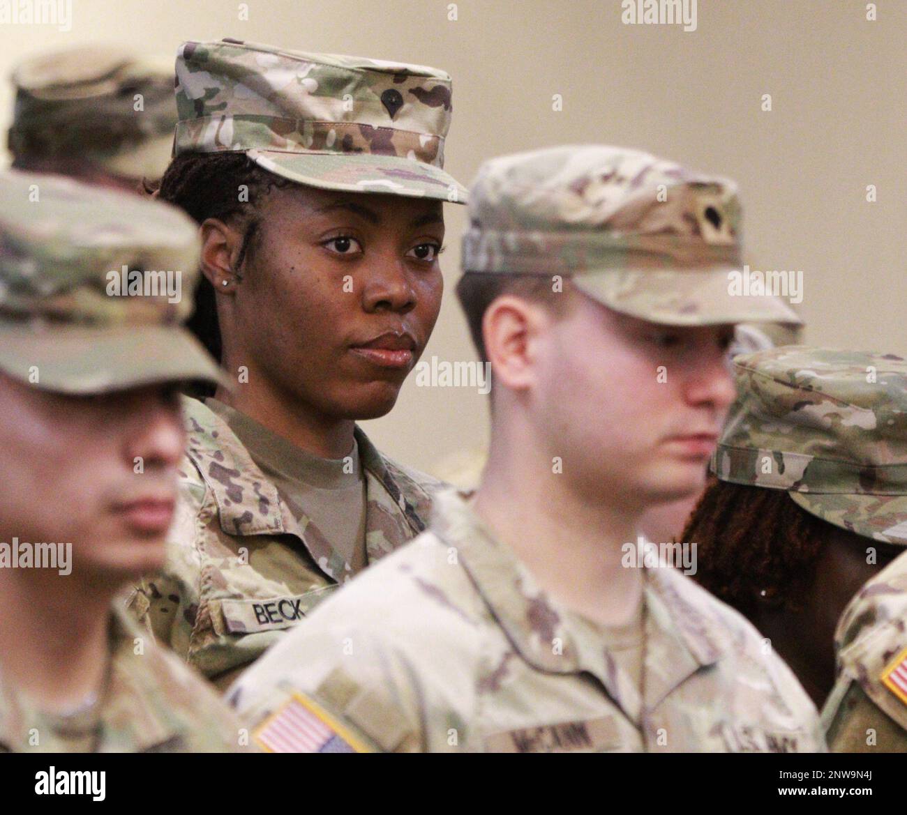 Spc. Ariel Beck listens to Lt. Col. Danielle Price, the Commander of ...