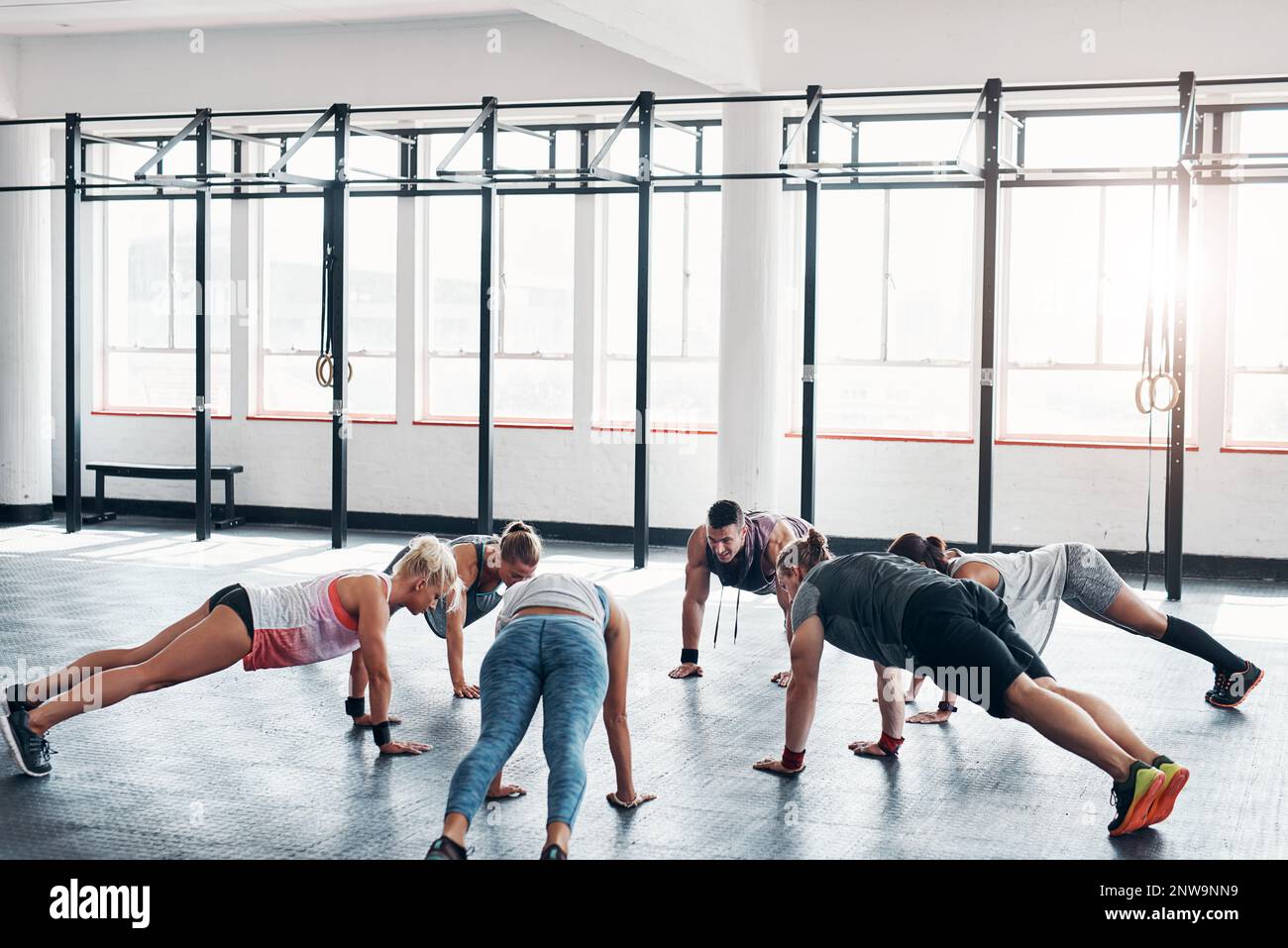 Make time for exercise. Shot of an accountability working out while ...