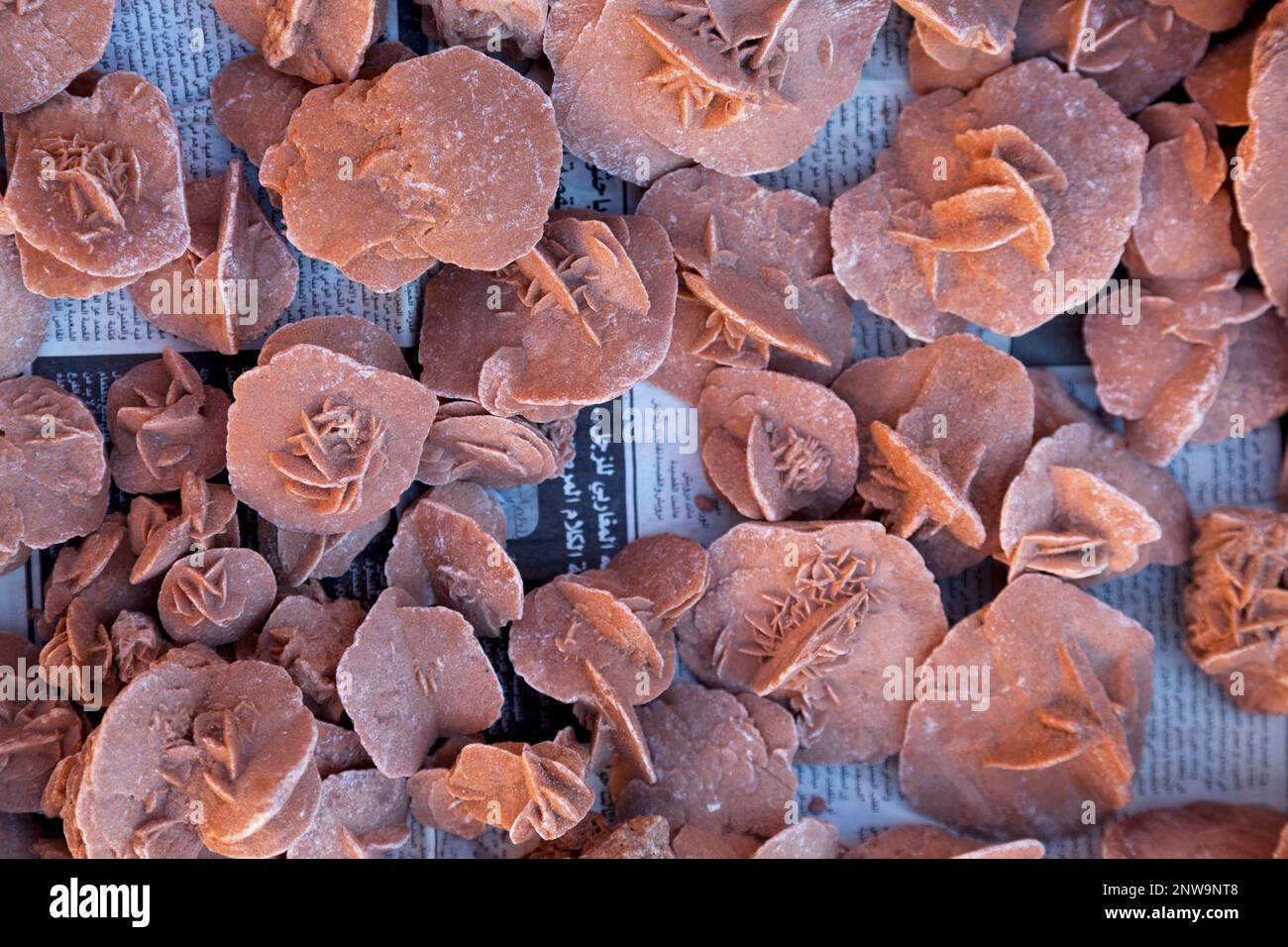 Stack of desert roses for sale in the souk of Aït Benhaddou, Morocco ...