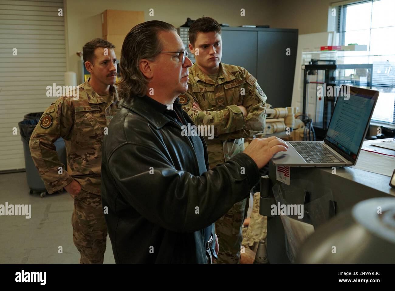 From left, U.S. Air Force Tech. Sgt. Phillip Wise, 6th Civil Engineer ...