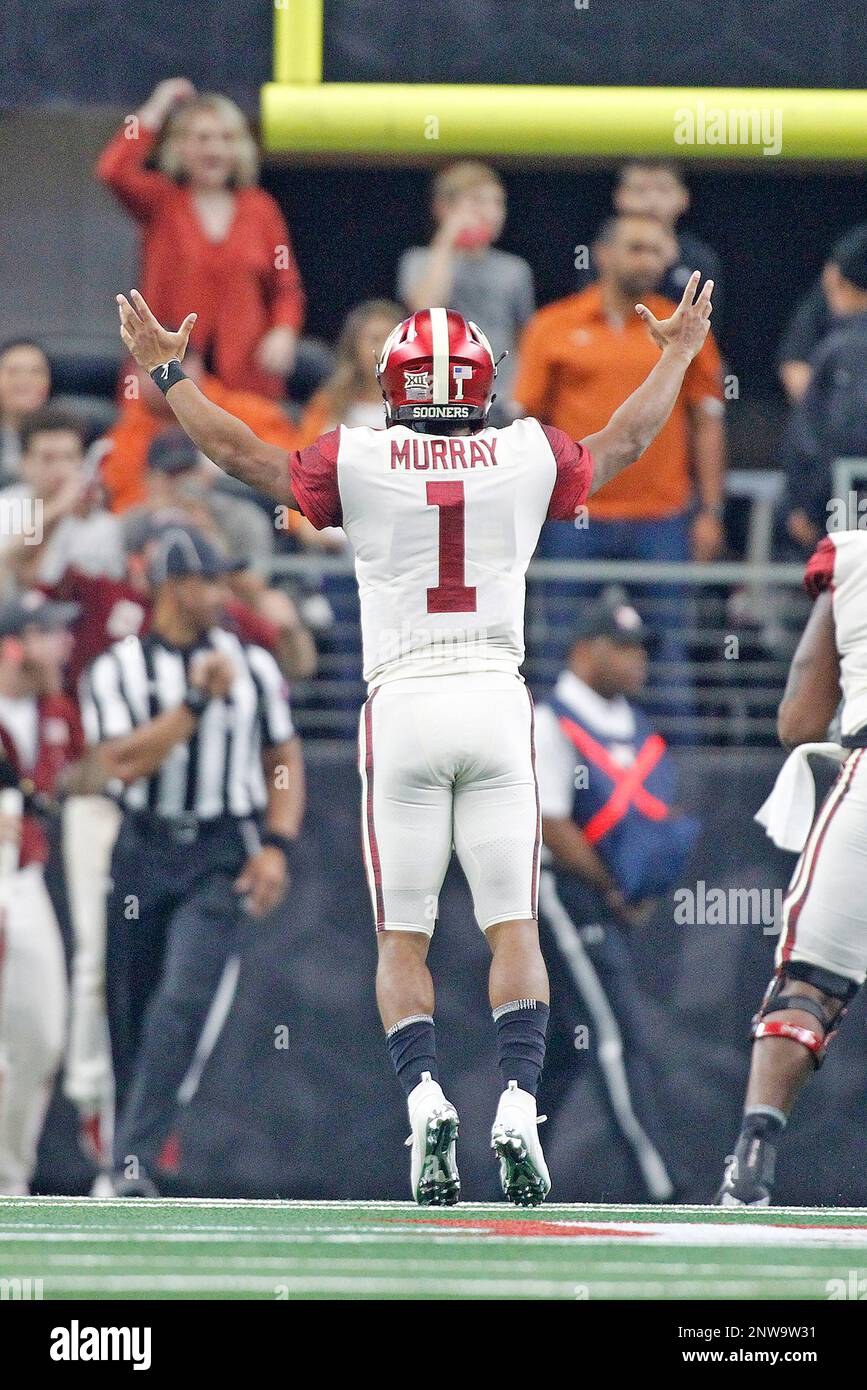 Oklahoma quarterback Kyler Murray (1) celebrates after a touchdown pass ...