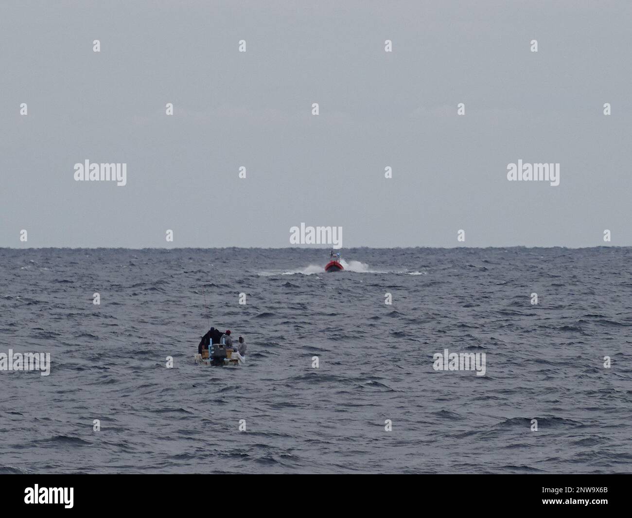 A 26-foot over-the-horizon cutter boat crew from the Coast Guard Cutter ...